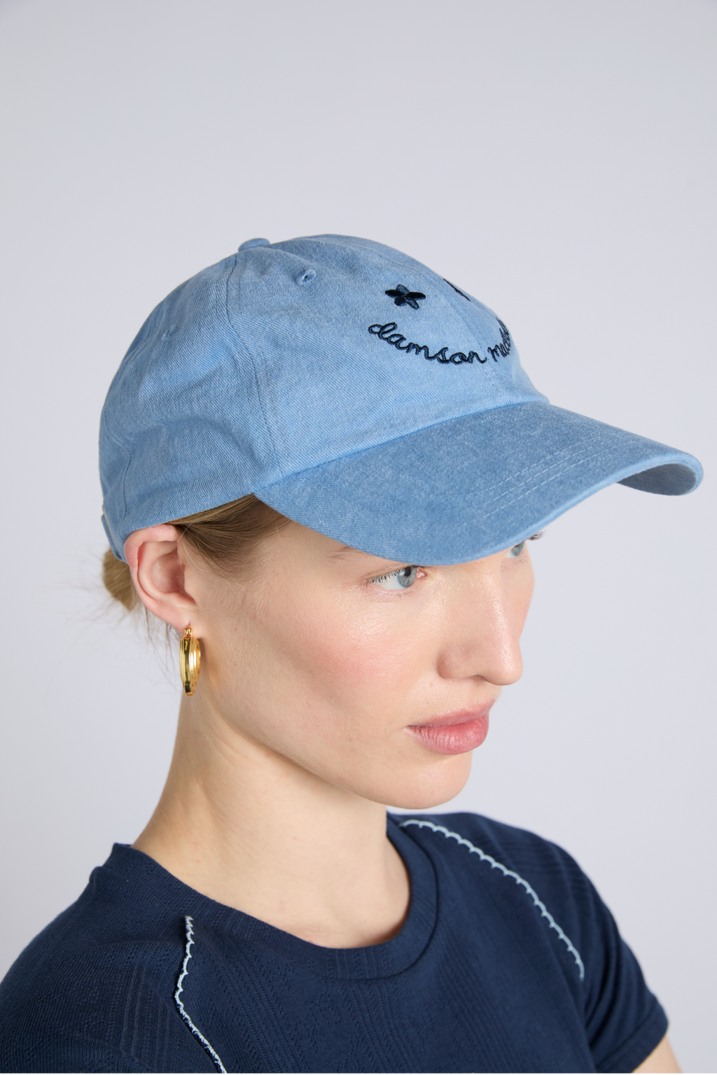 washed smiley cap in blue with navy embroidery – Damson Madder